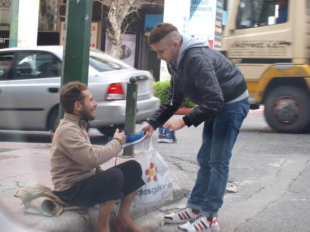Person Helping Homeless