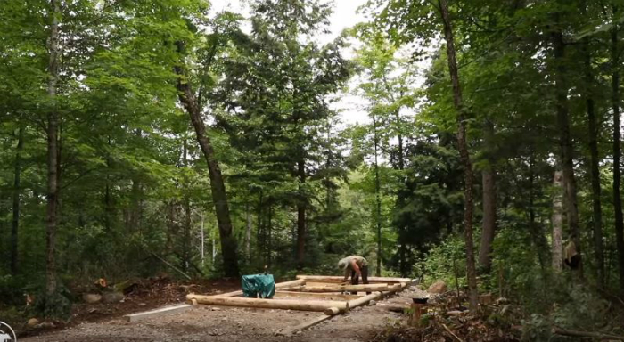 Time-Lapse Of Man Building Log Cabin In Wilderness—InspireMore