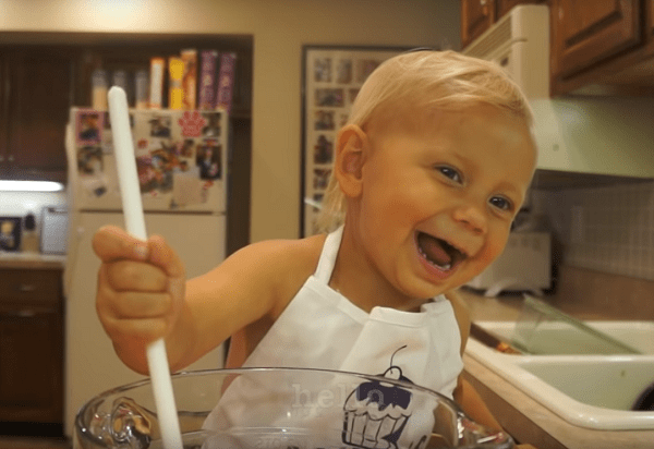 Tiny 2-Yr-Old Bakes Cake In Cute Cooking Show - InspireMore